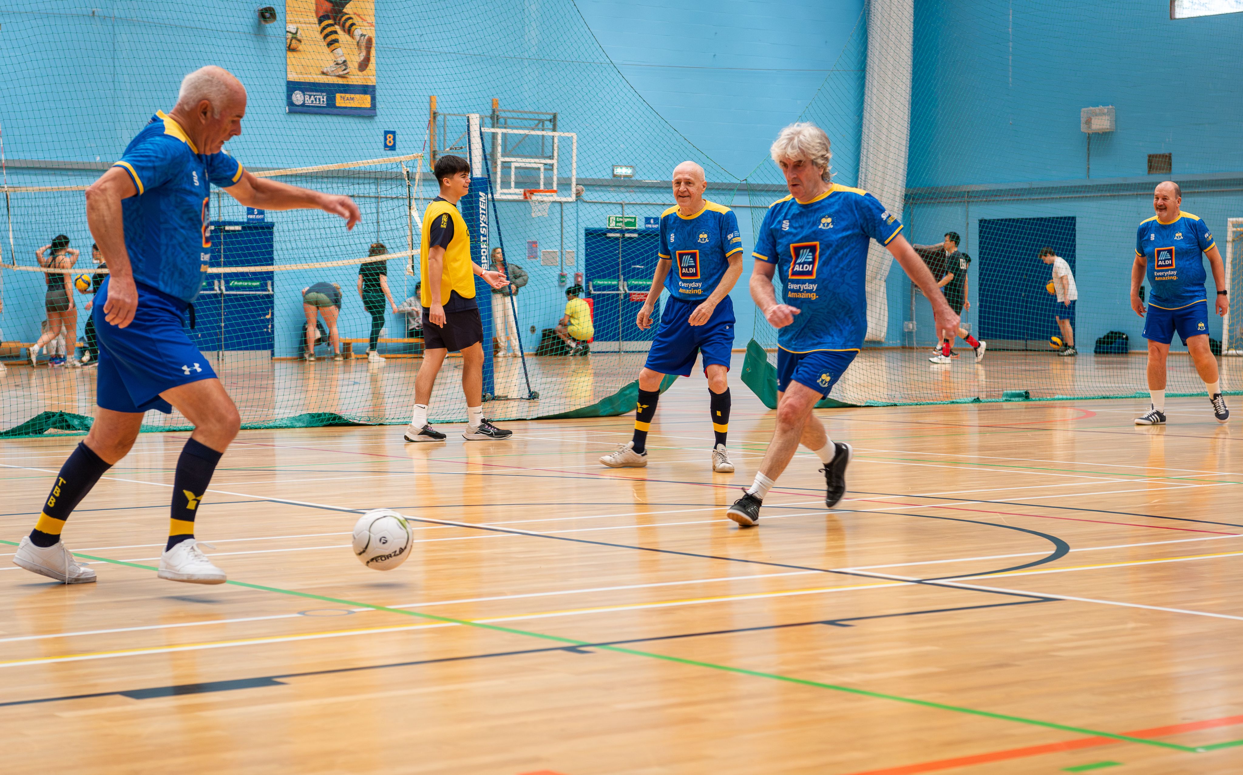 The team playing football at the 1974 football reunion